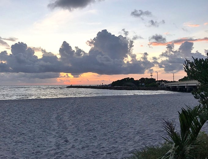 Sunset transforms Blind Pass Beach into nature's canvas, painting the sky in colors no filter could improve.