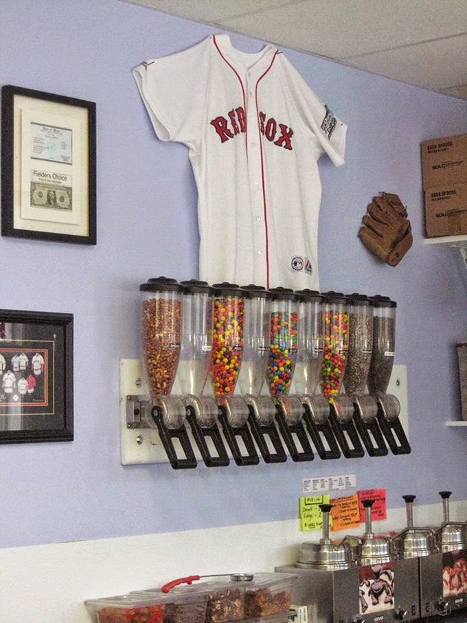 Candy dispensers stand ready for action beneath baseball memorabilia &ndash; a sugar-fueled tribute to America's pastime.