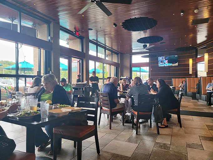 Diners enjoying that magical moment when conversation pauses because the food demands complete attention.