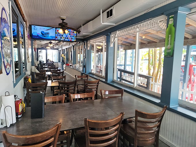 The dining area offers that perfect blend of casual comfort and coastal cool&mdash;where conversations flow as easily as the drinks.