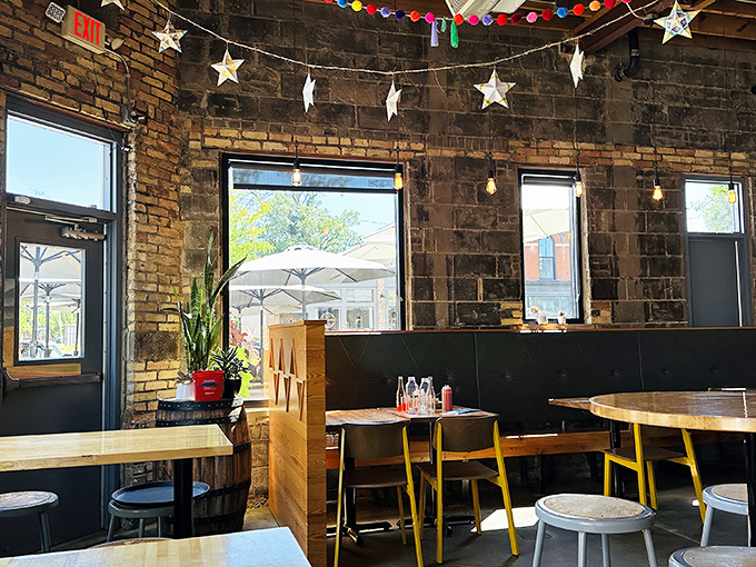 Exposed brick and natural light create the perfect backdrop for memorable meals and conversations that flow as freely as the drinks.