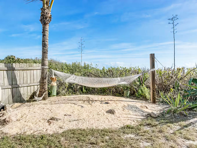 A hammock strung between posts becomes your new favorite reading spot, napping location, and general life philosophy all at once.