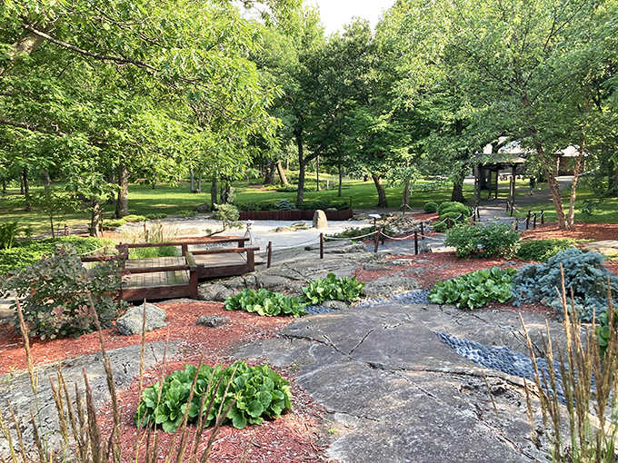 Japanese-inspired tranquility meets North Woods charm in this hillside haven, where stepping stones lead visitors through a miniature Minnesota-meets-Kyoto landscape.