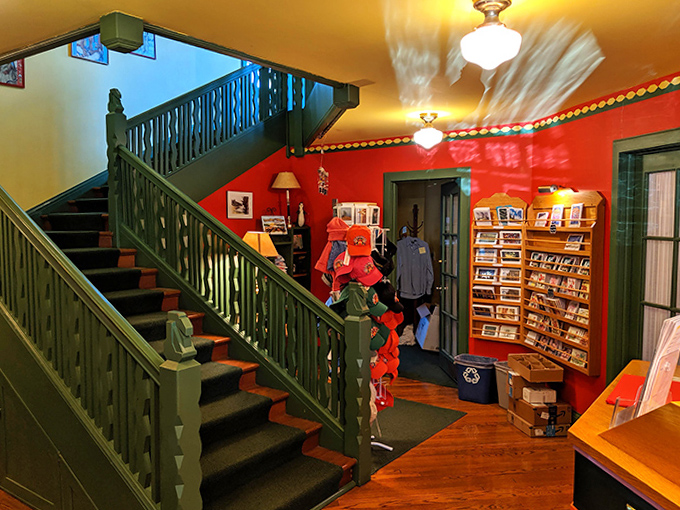 The lodge's interior staircase, painted in distinctive green, leads guests upward to rooms where modern distractions take a welcome backseat to simplicity.