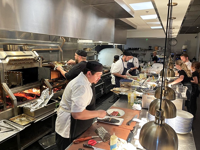 In the open kitchen, chefs transform Michigan's bounty into memorable dishes, working with the focused intensity of artists at their craft.