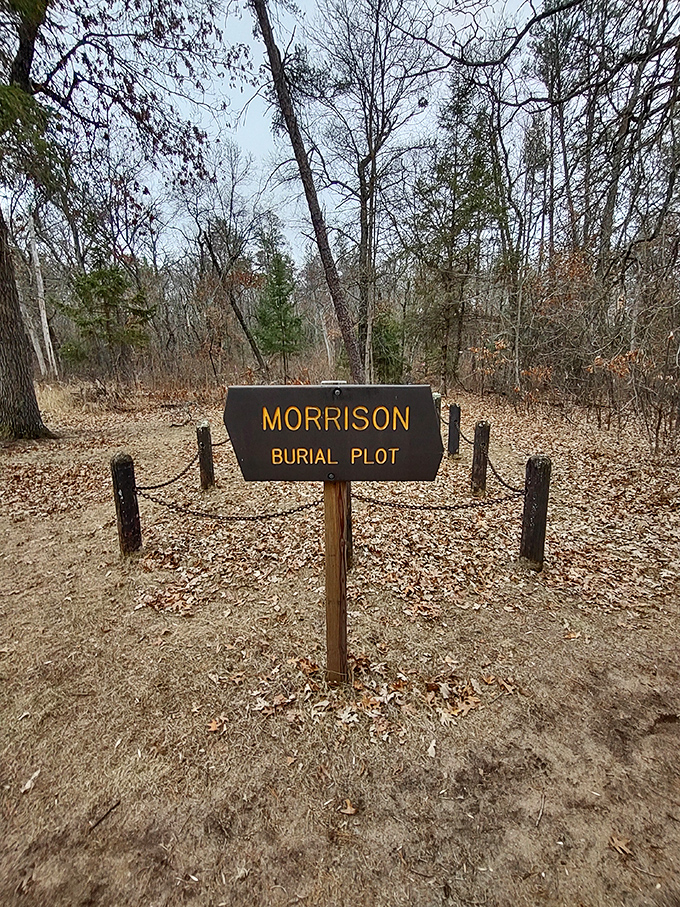 Simple wooden posts and a modest sign mark the Morrison Burial Plot, where frontier dreams found their final rest.