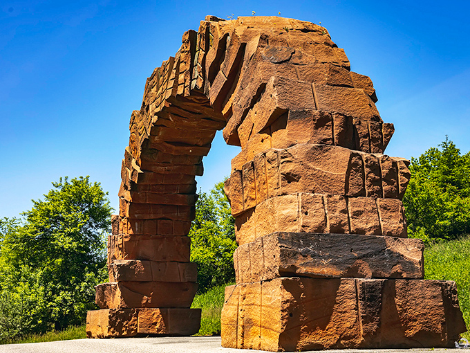 The stone arch stands as a monument to Grand Rapids' history, its weathered surface telling stories that predate selfies and social media.