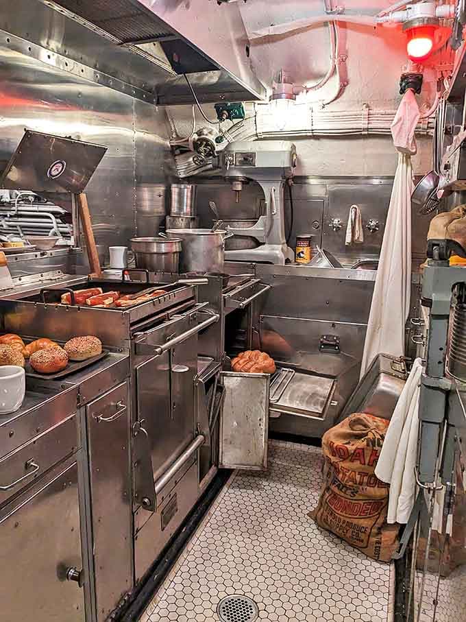 The submarine's galley somehow fed an entire crew from a space smaller than most modern walk-in closets, proving that necessity really is the mother of invention.