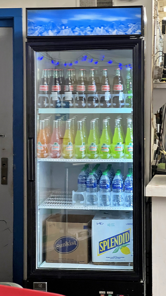 The beverage cooler at Mac's offers simple refreshment options &ndash; because sometimes a cold soda is the perfect companion to hot fried fish.