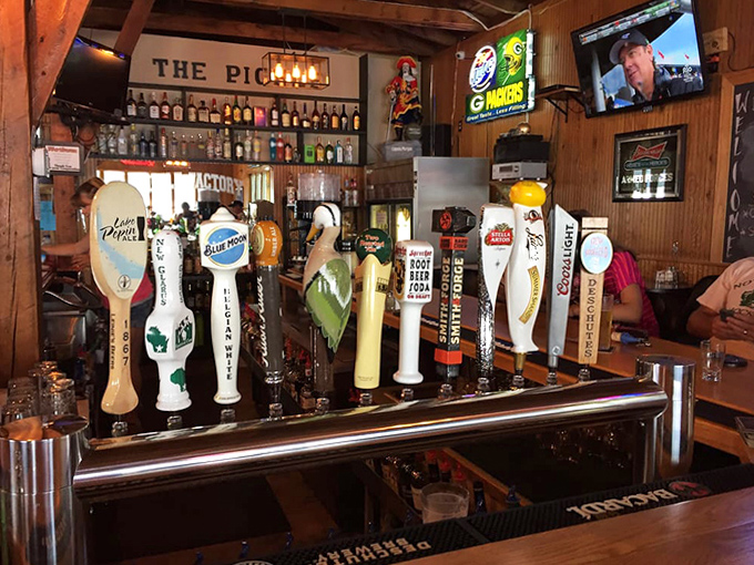 The bar showcases local pride &ndash; tap handles stand at attention, ready to pour Wisconsin craft beers that pair perfectly with the menu's offerings.