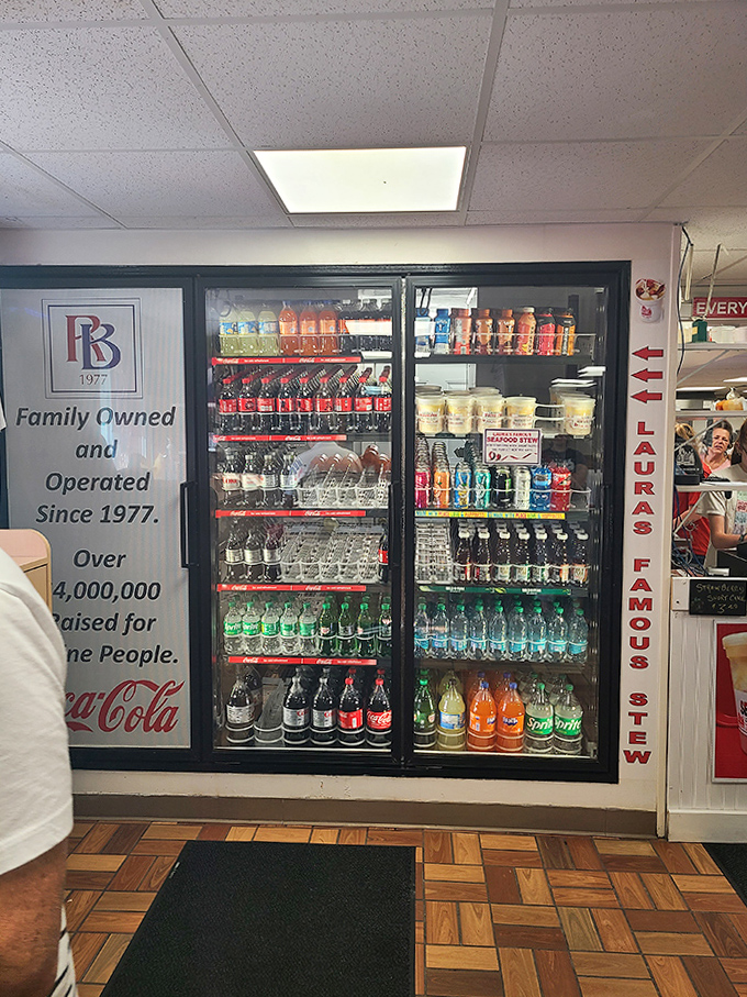 The wall of refreshment stands ready to quench thirsts worked up from all that seafood enjoyment.