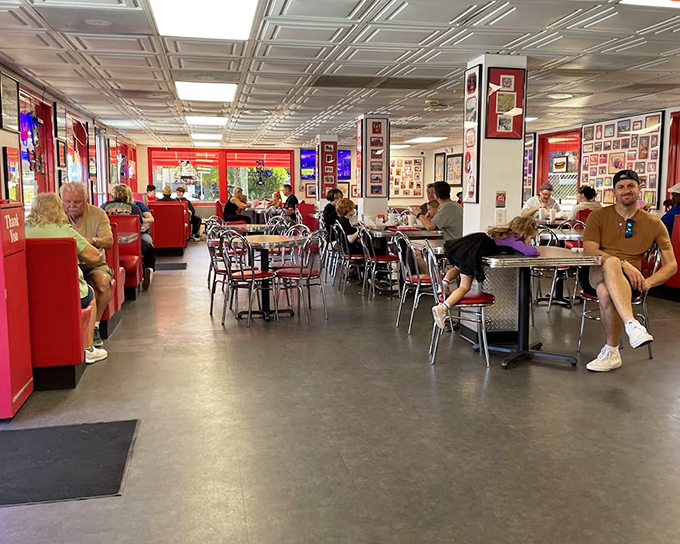 A bustling dining room where strangers become friends united by their love of perfectly crafted hot dogs and the joy of simple pleasures.
