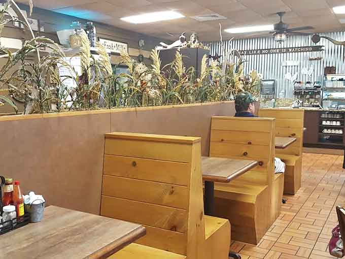 Those wooden booth dividers and farmhouse decorations create cozy spaces perfect for family dinners or catching up with friends over generous plates of food.