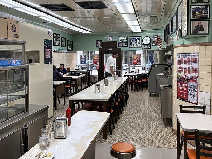 Rows of tables and counter seating ensure everyone gets a front-row seat to Detroit's most delicious tradition.