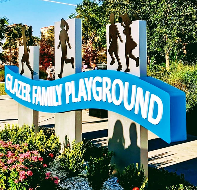 The Glazer Family Playground sign welcomes visitors to this aquatic wonderland where imagination and physical play find perfect harmony.