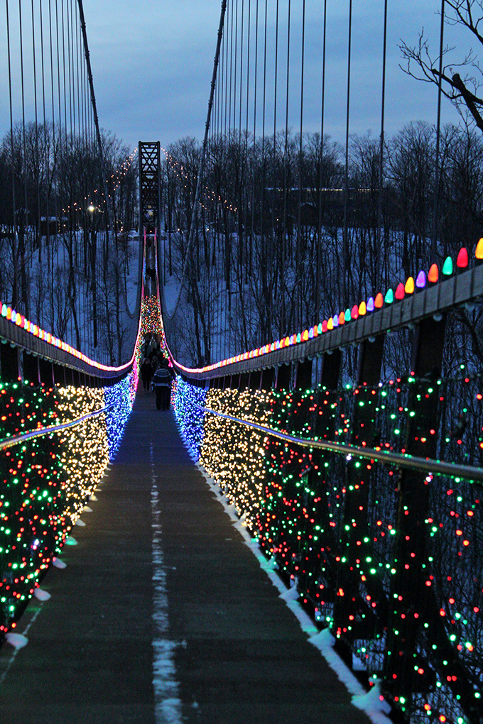 Holiday lights transform the bridge into a twinkling wonderland, like Christmas decorations designed by someone with unlimited imagination and electricity.
