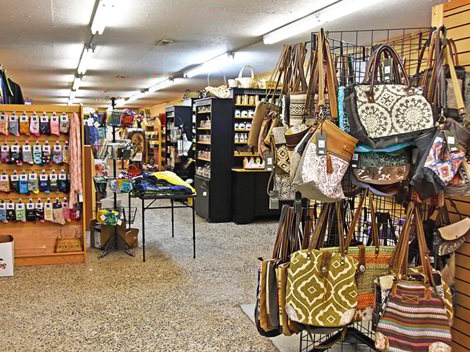 Handbags and totes hang like ripening fruit, promising to solve your carrying conundrums with style and Midwestern practicality.