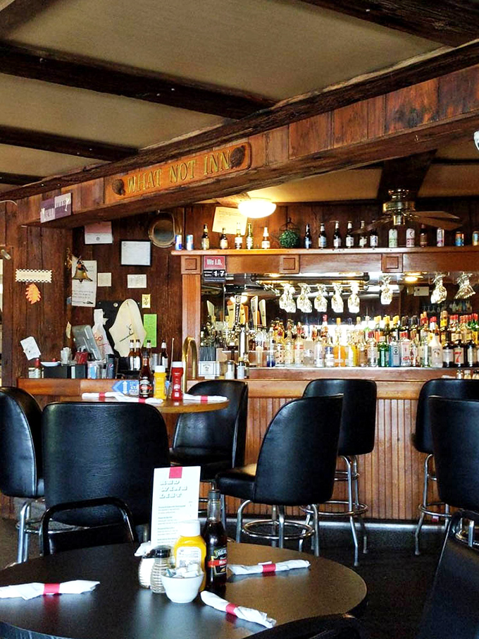 Rustic wood and warm lighting create the neighborhood tavern vibe where everybody feels like a welcomed regular immediately.