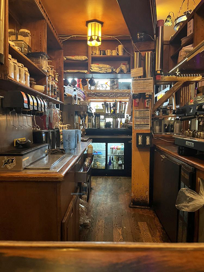 The bar area's warm wood tones and vintage lighting create an atmosphere where Hemingway himself would feel at home ordering a nightcap.