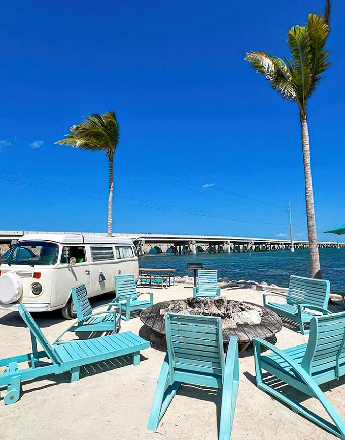 Beachfront living room perfection &ndash; these turquoise Adirondack chairs invite lazy afternoons of dolphin-watching between swimming sessions.