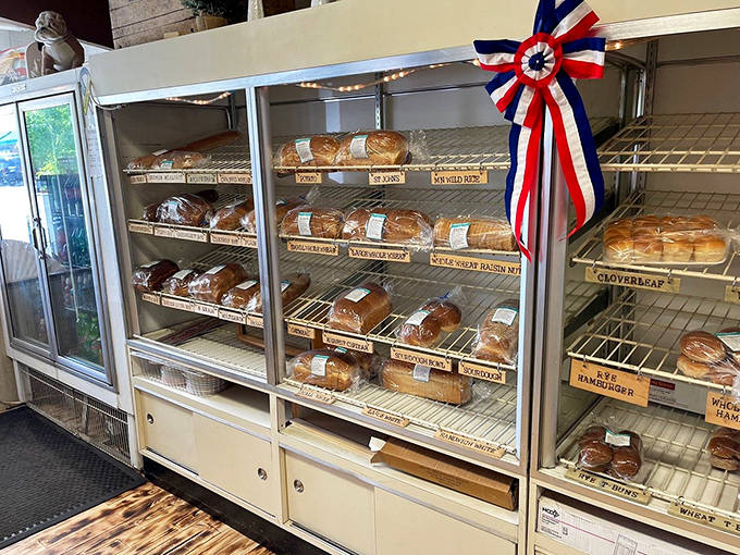 This bread display isn't just showing loaves &ndash; it's exhibiting carbohydrate architecture, each variety built on foundations of tradition and skill.