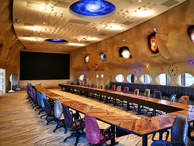 Conference rooms here look like something from a fantasy novel, complete with organic shapes and ambient lighting that make quarterly reports feel almost magical.