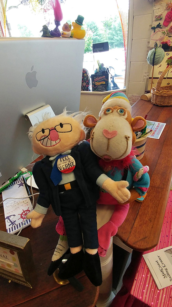 Quirky character dolls bring personality to the gift section, where Maine humor meets nostalgic charm in unexpected ways.