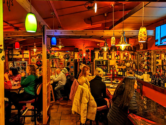 Happy patrons gather at the bar, proving that good food brings people together better than any social media platform.