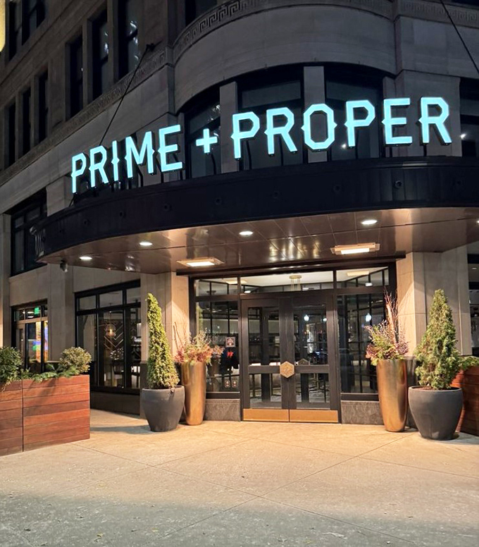 The turquoise sign glows like a beacon for those seeking culinary adventure in downtown Detroit.