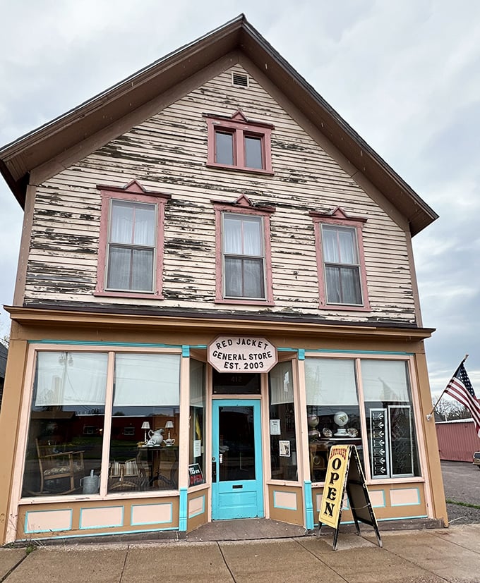 The Red Jacket General Store's weathered charm and turquoise door invite curious visitors to step back in time for modern treasures.