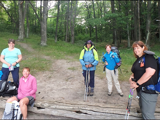 Trail friends sharing stories and snacks &ndash; forming the kind of bonds that only shared blisters can create.