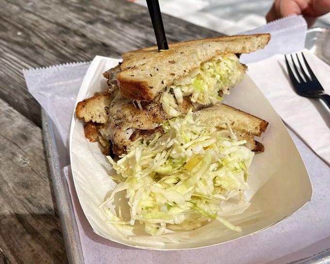 A simple sandwich elevated to art form – fresh fish, crisp vegetables, and the perfect bread make magic happen.