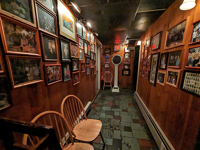A hallway gallery of memories lines the path to more dining areas, each framed moment capturing The Bear's storied history.