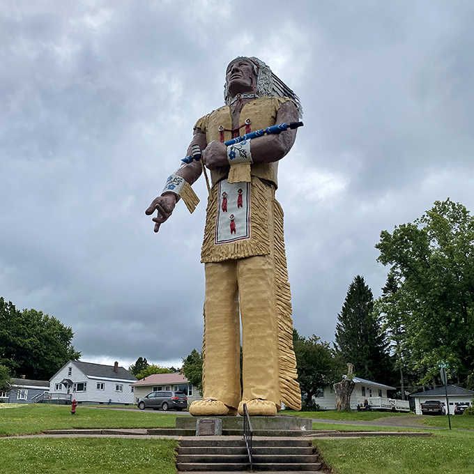 Hiawatha stands tall as the world's largest Native American statue, a 52-foot guardian spirit welcoming visitors with an outstretched hand and impressive presence.