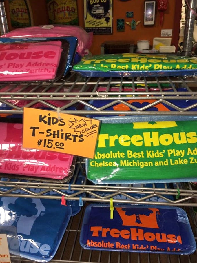 Colorful TreeHouse t-shirts await new owners – wearable souvenirs that will eventually become beloved pajama tops and painting shirts.