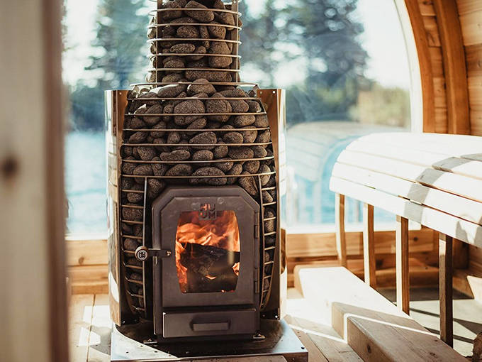 The sauna's heart &ndash; a stone-surrounded wood stove &ndash; glows with fiery determination to turn Minnesotans into willing puddles of relaxation.