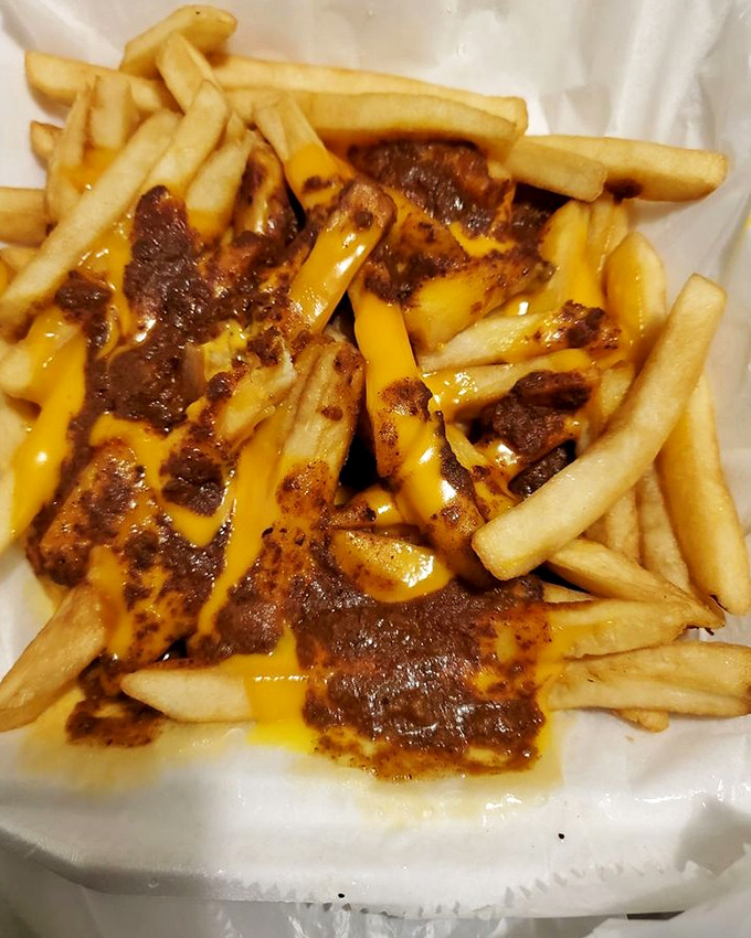 Chili cheese fries&mdash;the dish that asks, "Why choose between two perfect things when you can have both?" A beautiful mess worth every napkin.