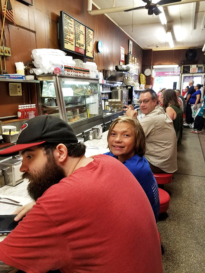 Every stool tells a story&mdash;diverse patrons united by the pursuit of unpretentious food in a space where everyone belongs.