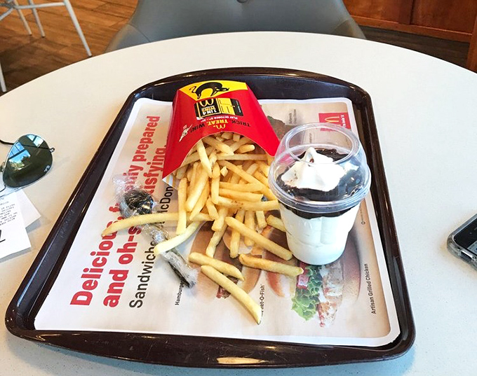 Summer dining perfection: The outdoor seating area offers a garden-like setting for enjoying classic McDonald's fare in the Maine sunshine. 