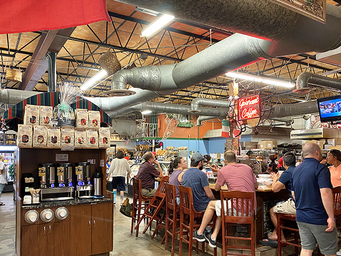 Where coffee station meets community table. The exposed ductwork overhead is practically a metaphor for the industrial-strength deliciousness below.