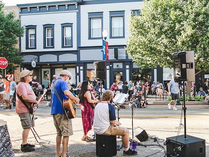 Street performers bring downtown Zeeland alive with music and community spirit during seasonal festivals that transform ordinary streets into celebration spaces.