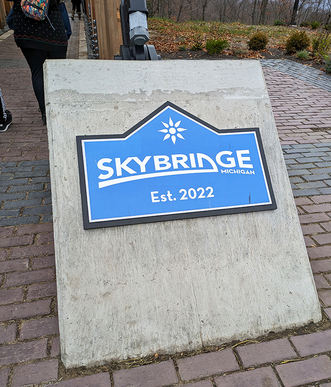 The monument sign welcomes visitors to Michigan's newest landmark, established in 2022 but already legendary in adventure circles.