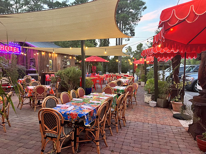 Outdoor dining under Florida skies, where colorful tablecloths compete with the sunset and every breeze carries possibilities.