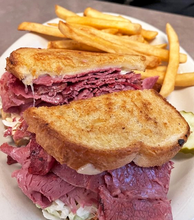 Reuben sandwich: This towering creation stacks corned beef higher than Abbey Road's sales figures, with Swiss cheese and sauerkraut playing perfect supporting roles.