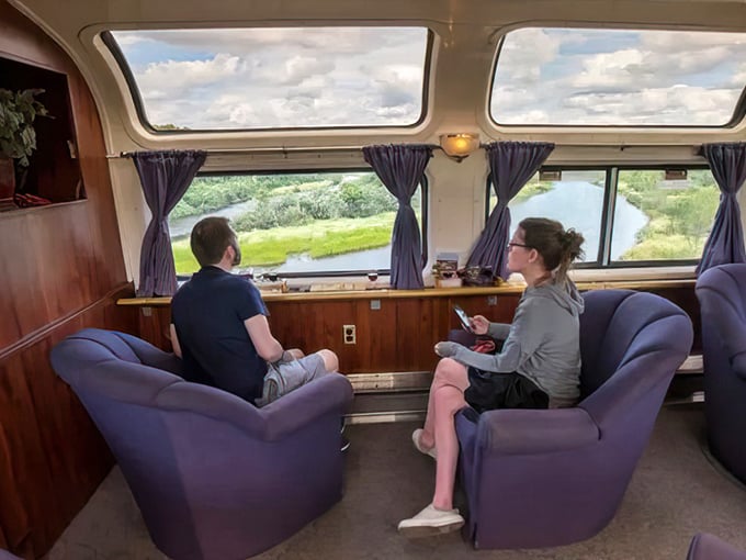 Comfortable lounge chairs and panoramic windows transform travel time into a moving meditation on Wisconsin's natural beauty.