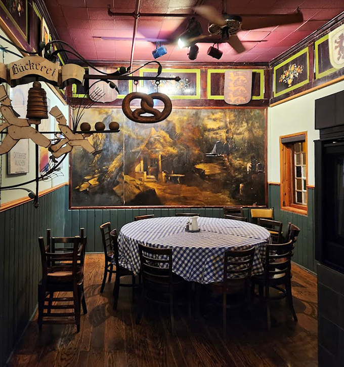 A cozy dining nook where conversations flow as freely as the beer. That pretzel hanging from the ceiling isn't decoration, it's inspiration!