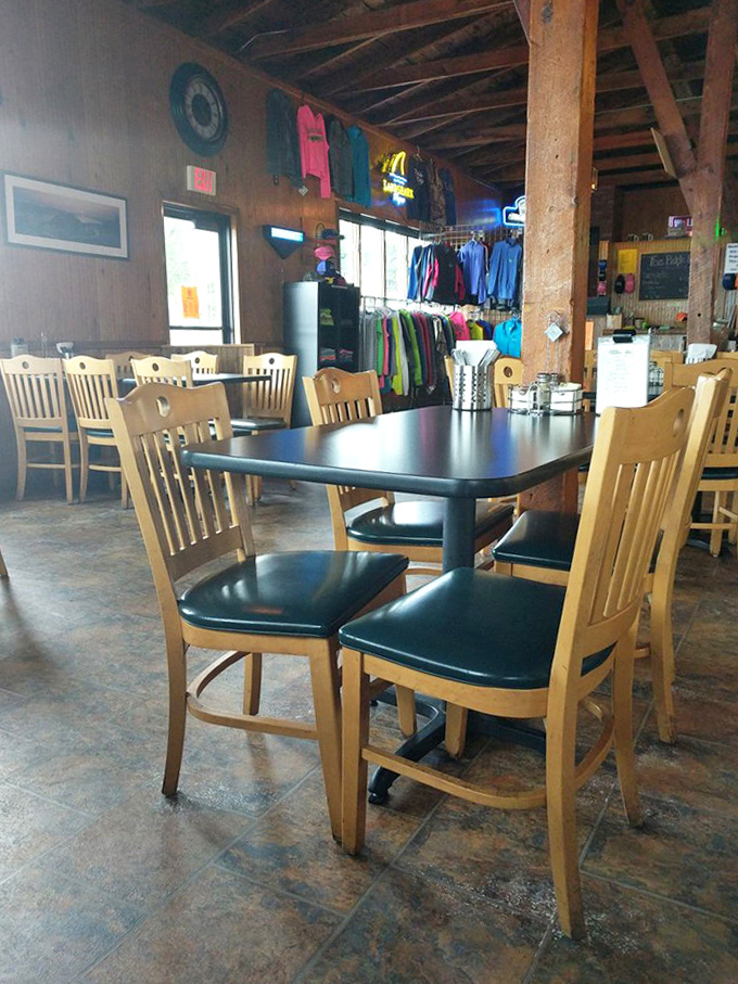 Every table tells a story &ndash; simple wooden chairs invite you to settle in and stay awhile in this dining room where time seems to slow down.