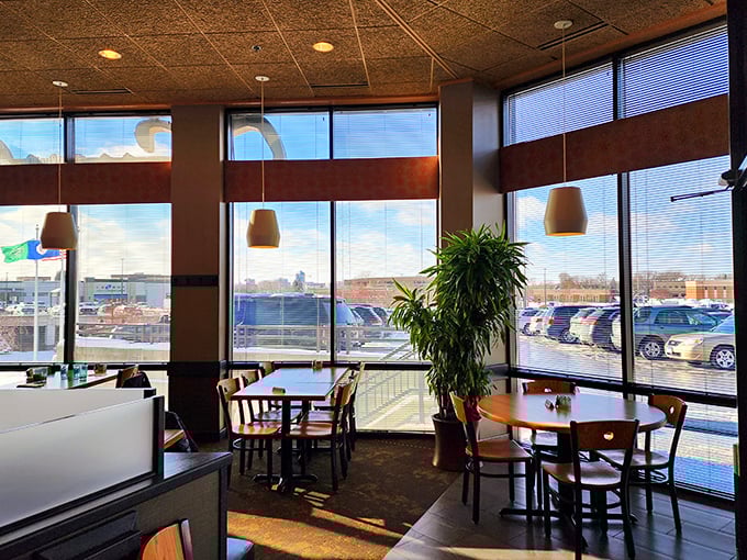 Window seating offers views of the outside world, though most diners are too focused on the culinary landscape on their plates to notice.