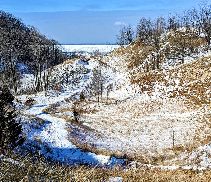Winter transforms Grand Mere into a snow-dusted wonderland, where glass hunting requires dedication and very warm gloves.
