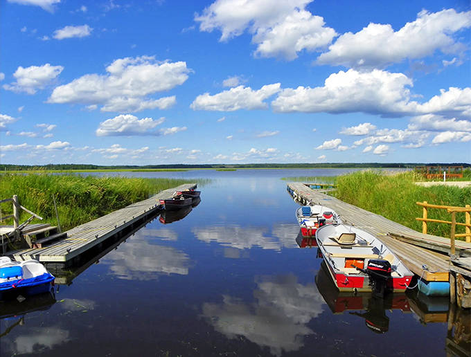 Wooden docks extend like fingers into Lake of the Woods, providing gateways to adventure on the vast waters.